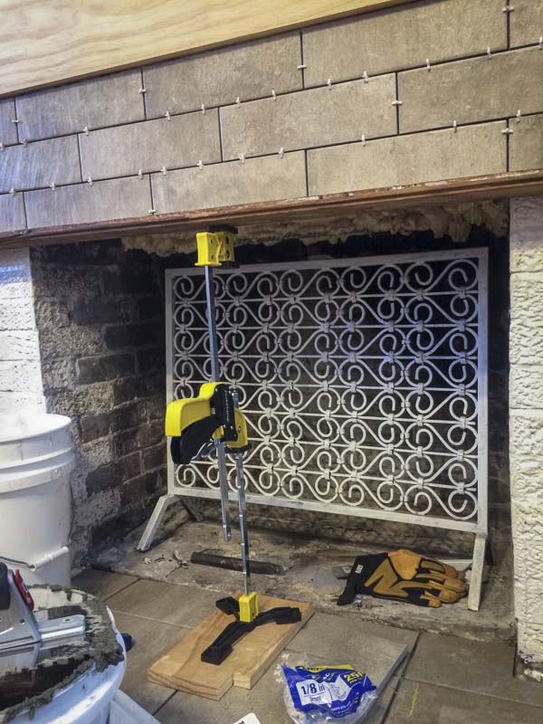 Renovating With a Tile Over Brick Fireplace Design